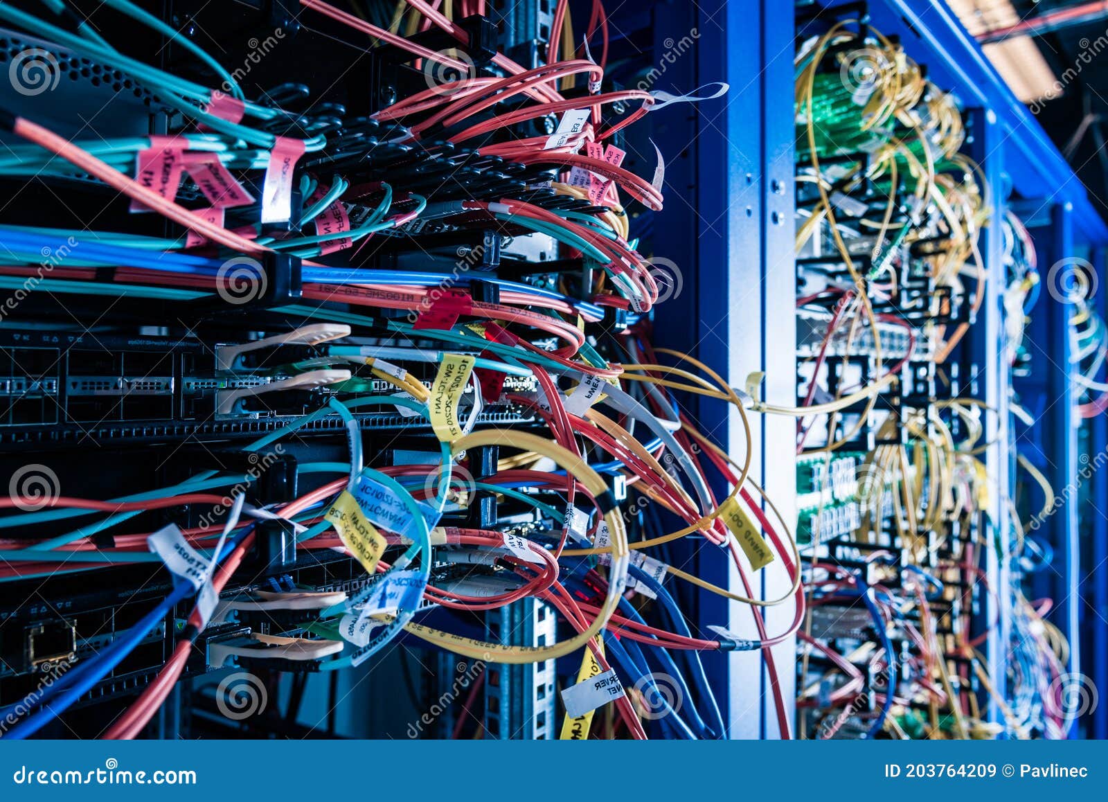 Server Rack with Fiber Optic Cables Attached To Front Panel Swit Stock ...