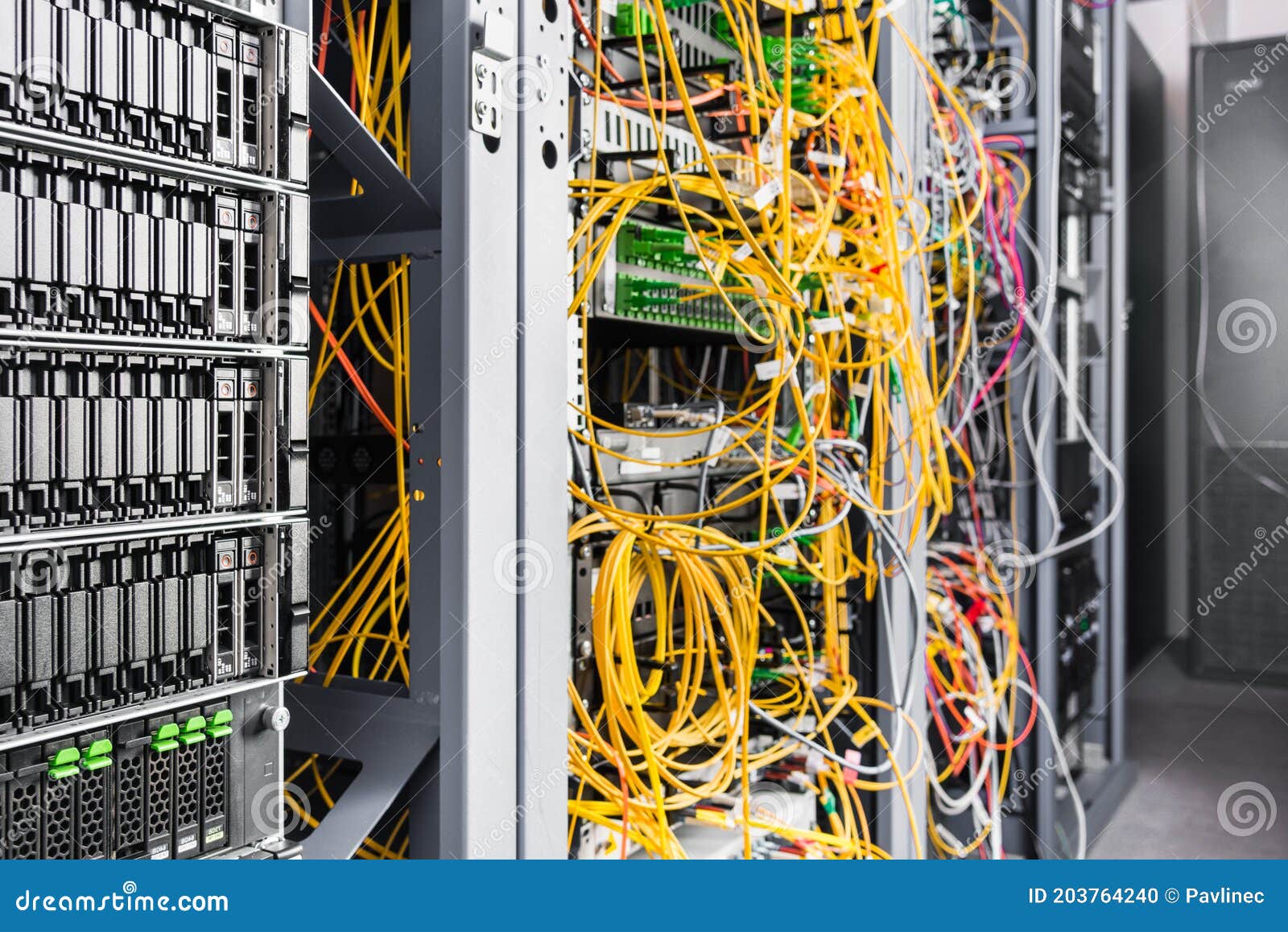 Server Rack with Fiber Optic Cables Attached To Front Panel Swit Stock ...