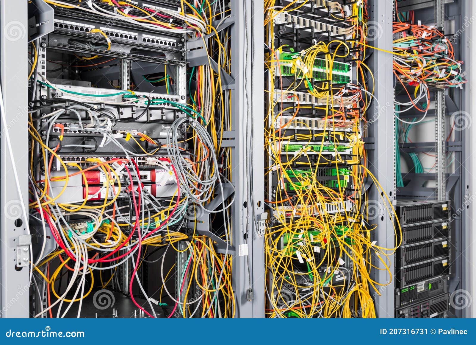 Server Rack with Fiber Optic Cables Attached To Front Panel Swit Stock ...