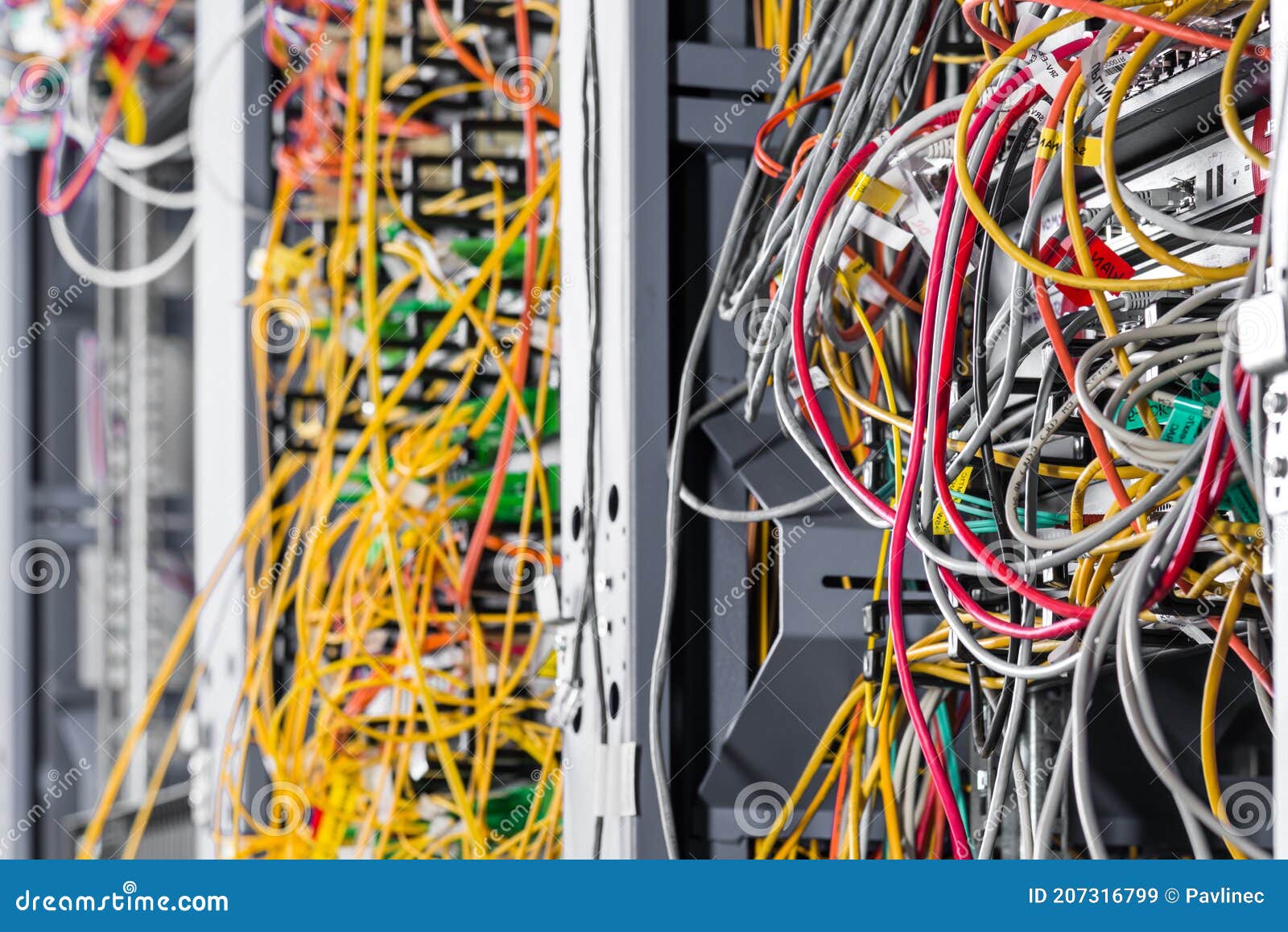 Server Rack with Fiber Optic Cables Attached To Front Panel Swit Stock ...