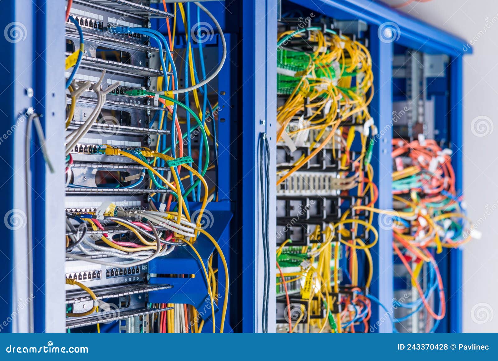 Server Rack with Fiber Optic Cables Attached To Front Panel Swit Stock ...