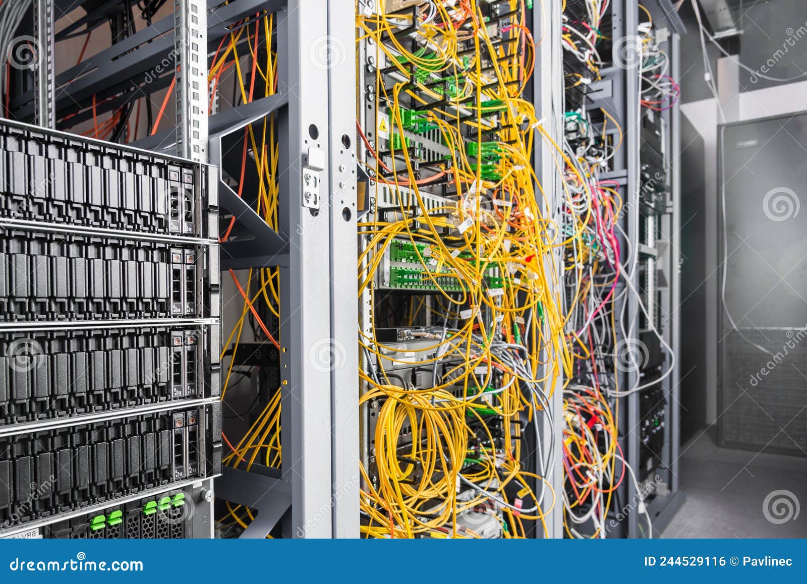 Server Rack with Fiber Optic Cables Attached To Front Panel Swit Stock ...