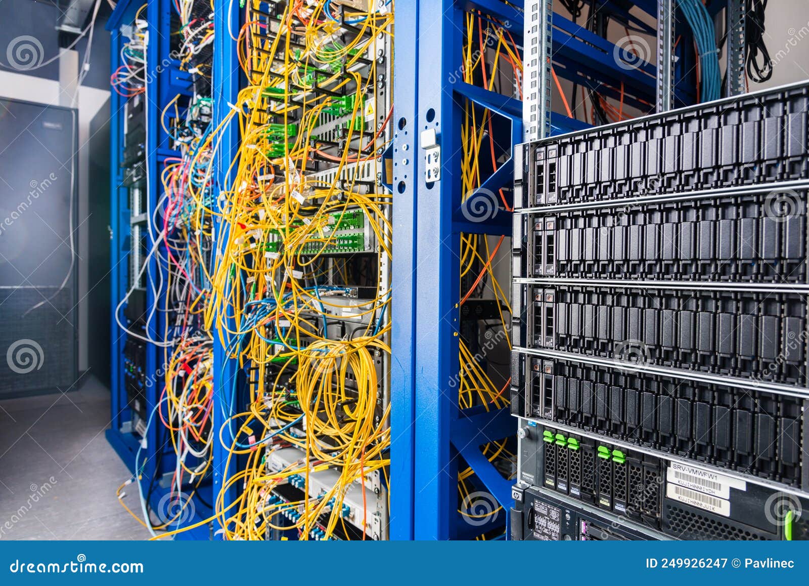 Server Rack with Fiber Optic Cables Attached To Front Panel Swit Stock ...