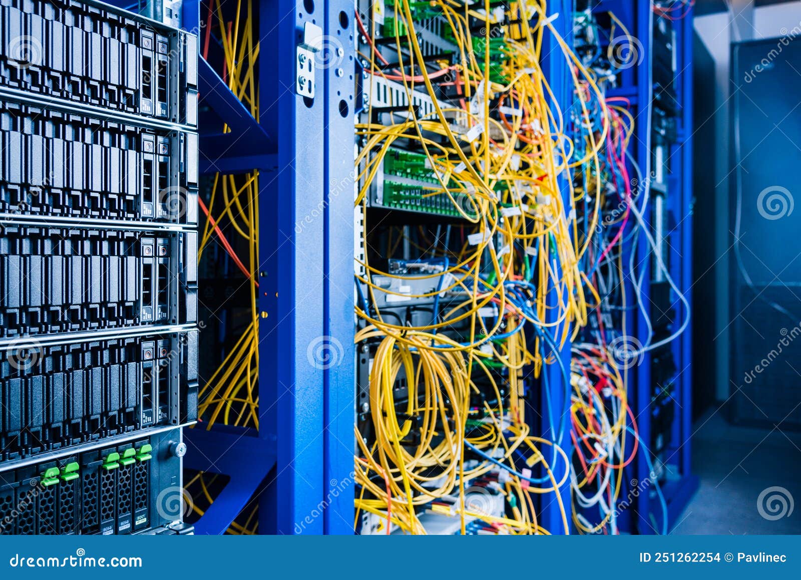 Server Rack with Fiber Optic Cables Attached To Front Panel Swit Stock ...