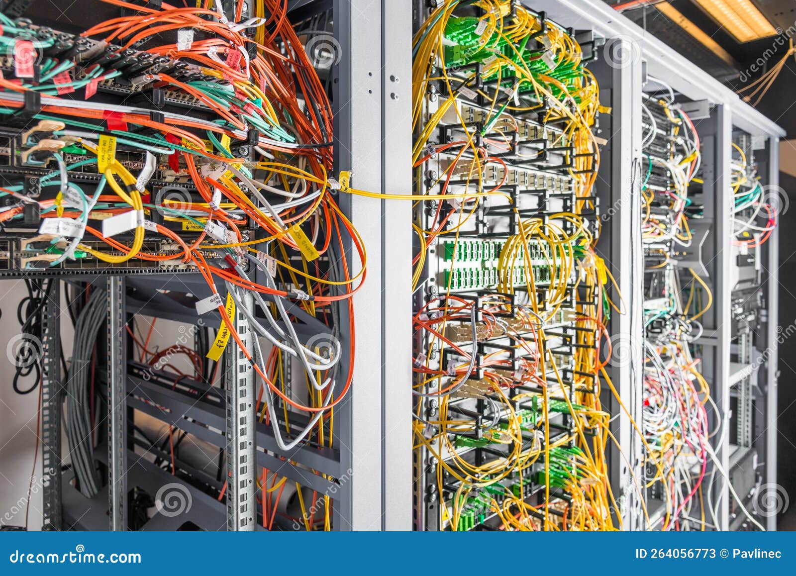 Server Rack with Fiber Optic Cables Attached To Front Panel Swit Stock ...