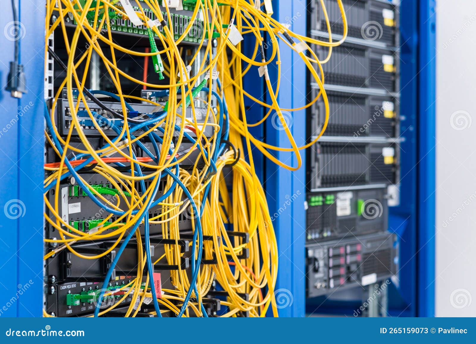 Server Rack with Fiber Optic Cables Attached To Front Panel Swit Stock ...