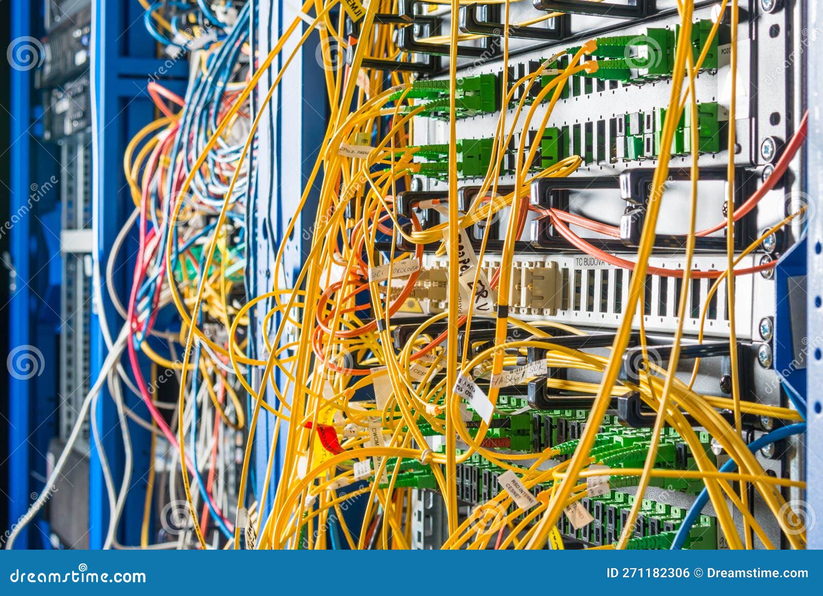 Server Rack with Fiber Optic Cables Attached To Front Panel Swit Stock ...