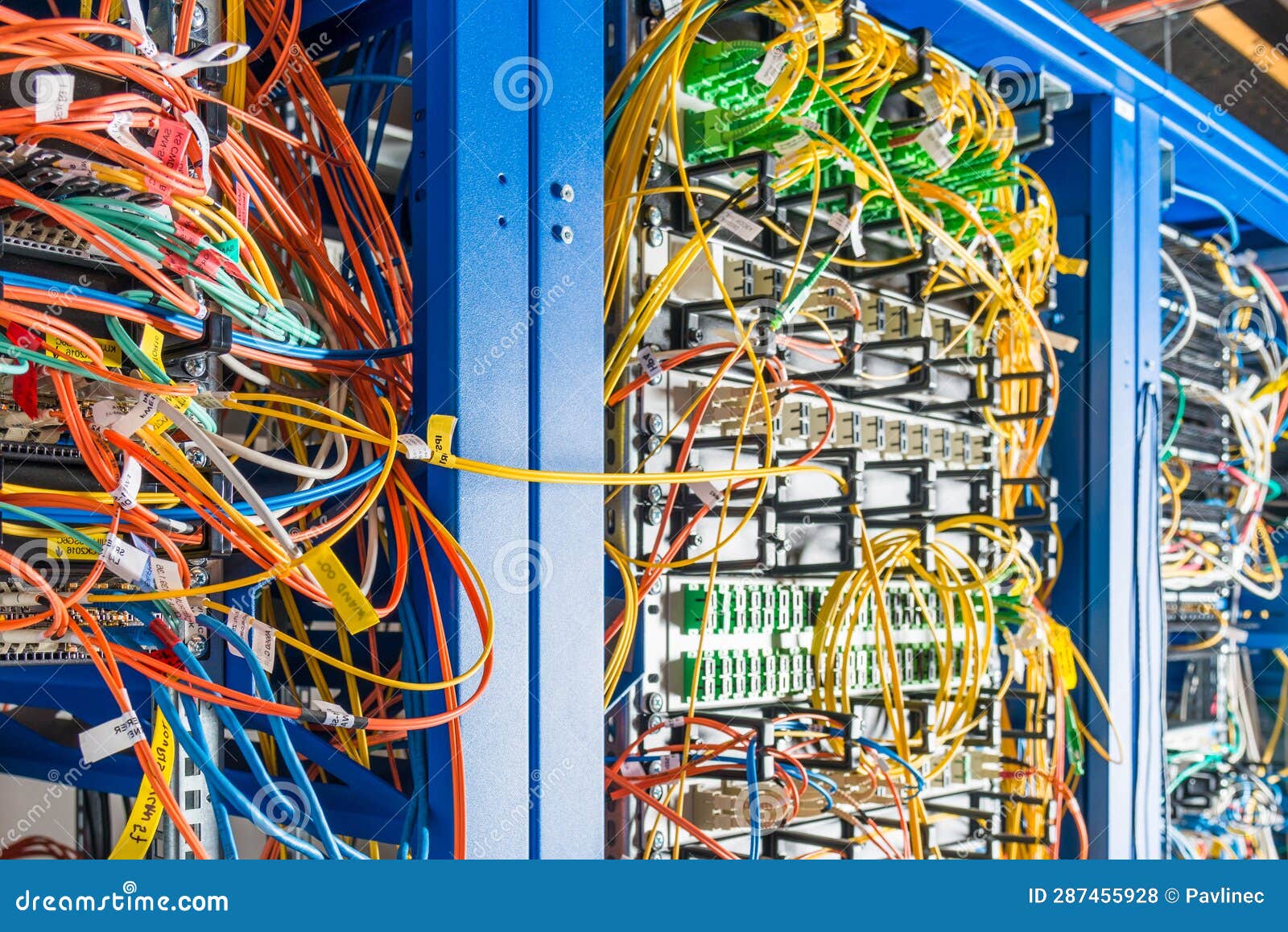 Server Rack with Fiber Optic Cables Attached To Front Panel Swit Stock ...
