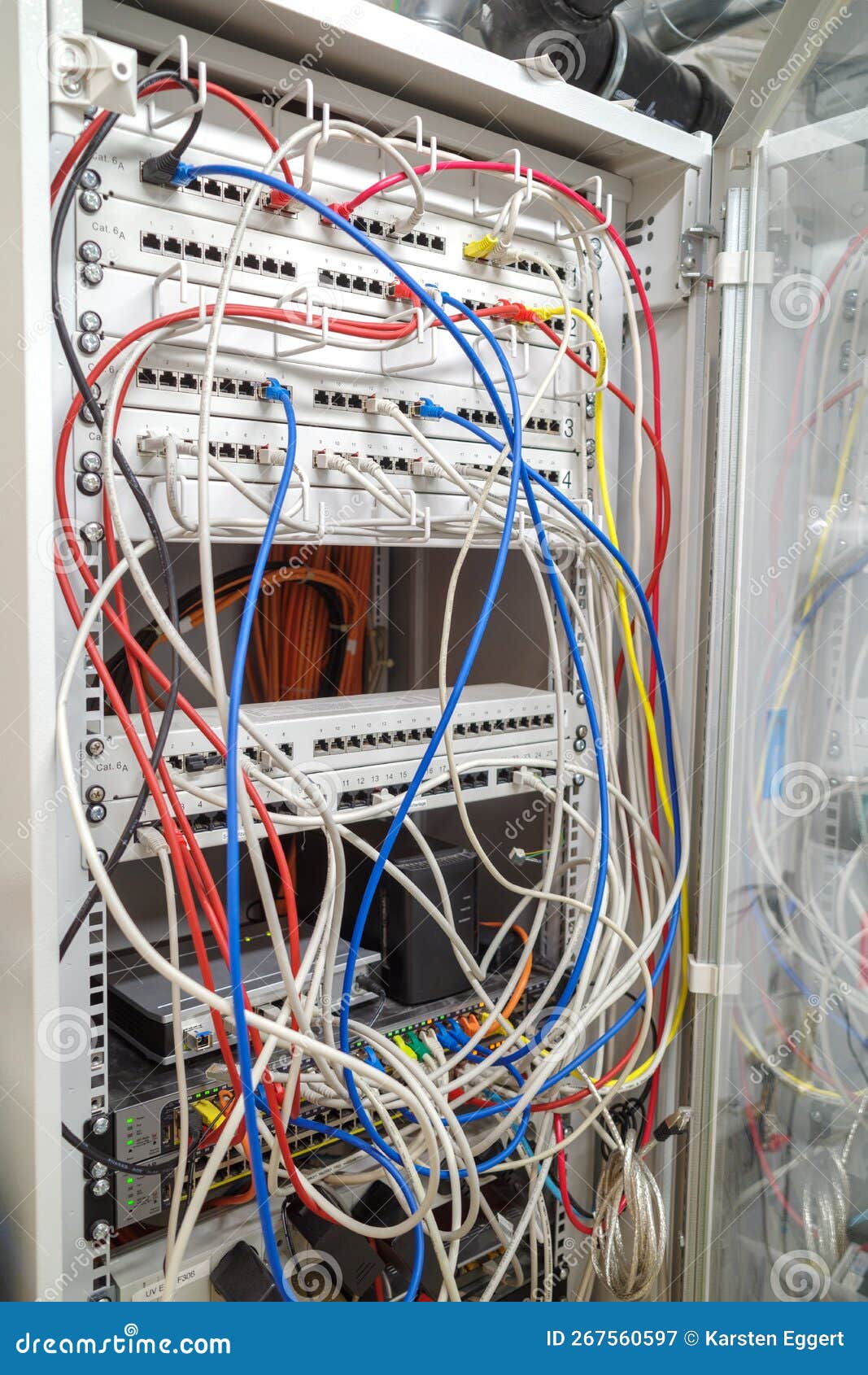 In a Server Rack Many Different Colored Network Cables are Connected To ...
