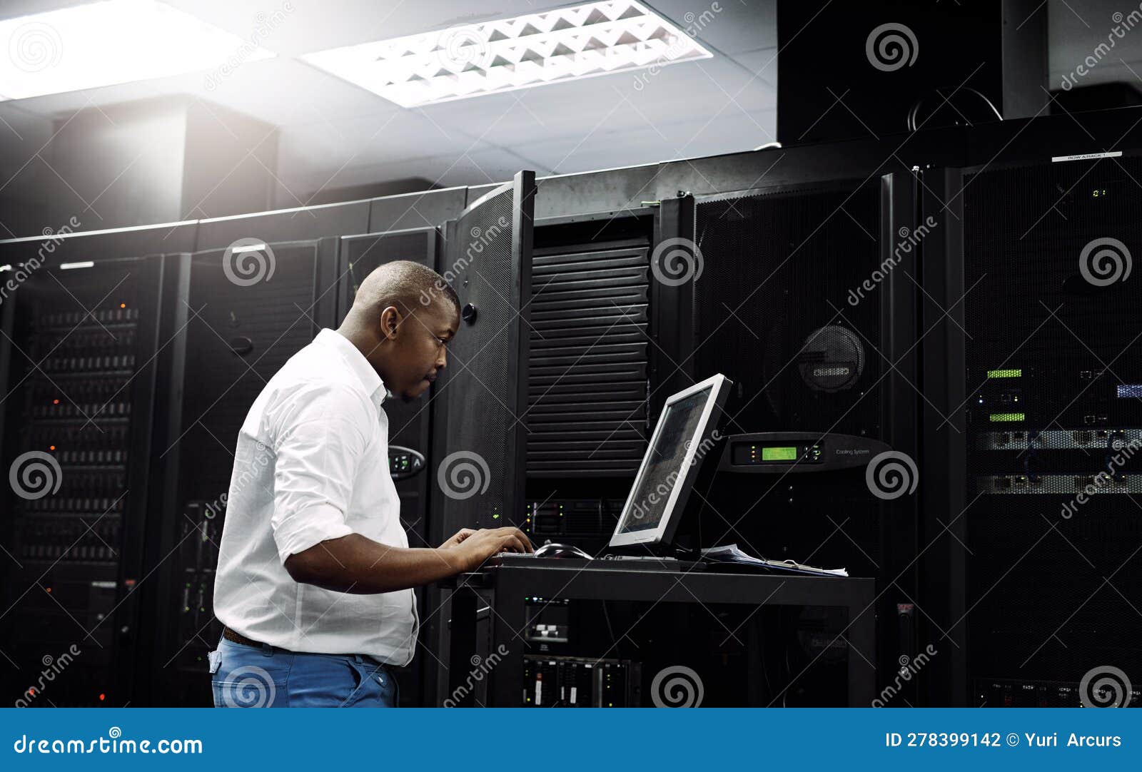 Server Room Black Man Or Coding On Computer For Programming Or Digital