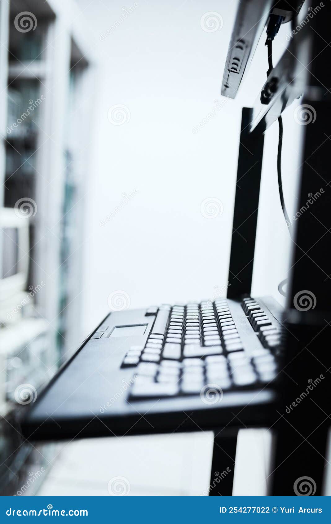 The Server Room. a Computer Monitor and Keyboard Inside of a it Server ...