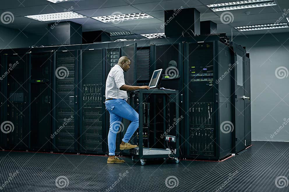 Server Room, Database and Information Technology with an Engineer Man ...
