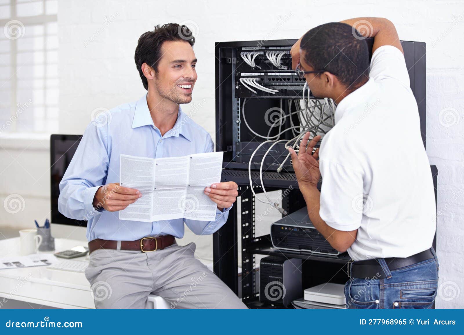 Server Room, it Support and Manual with a Technician Talking To a ...