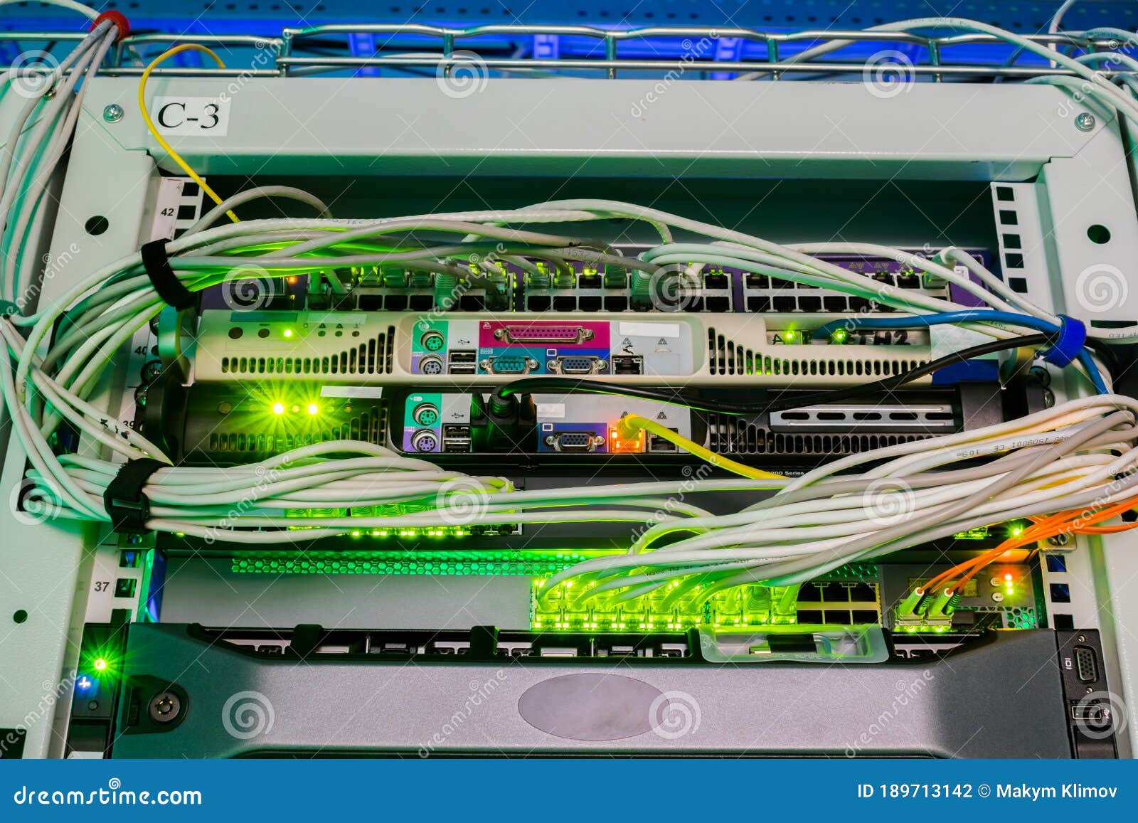 Servers and Switches Operating in a Rack of Server Room Stock Photo ...
