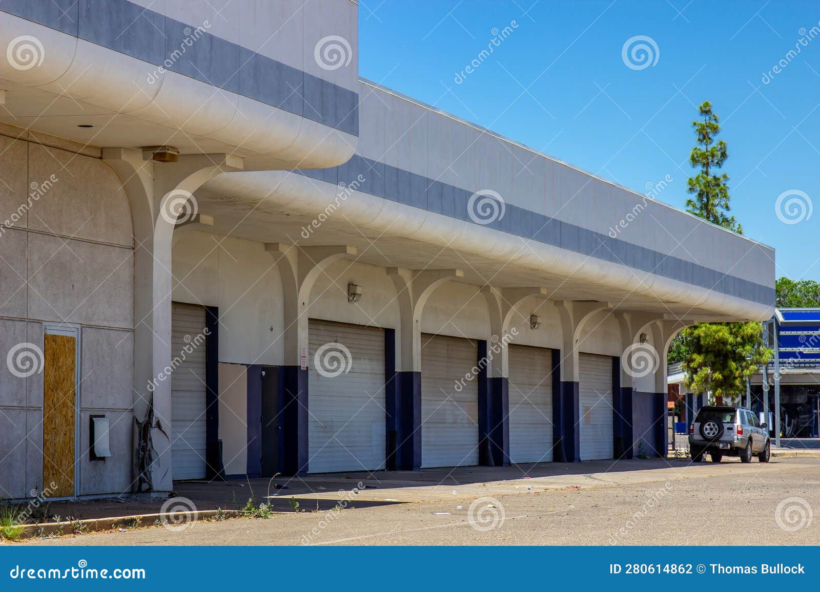 Service Bay Doors on Abandoned Commercial Building Stock Photo - Image ...