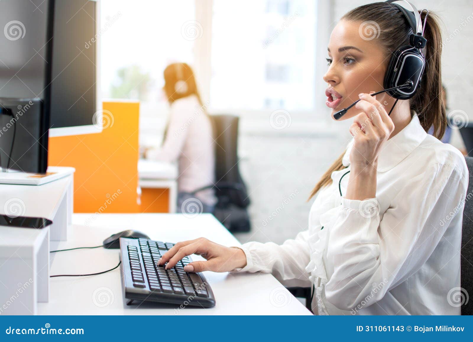 It Service Desk Female Operator Talking To Client Using Headset and ...