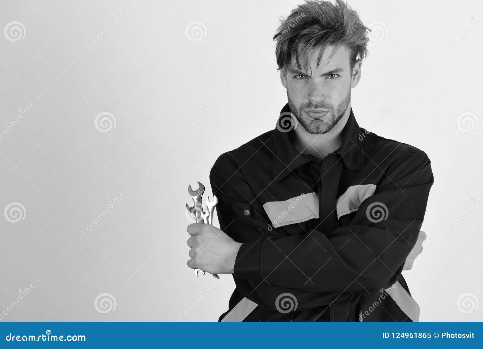 Service and Engineering Concept. Man with Serious Face in Uniform Stock ...