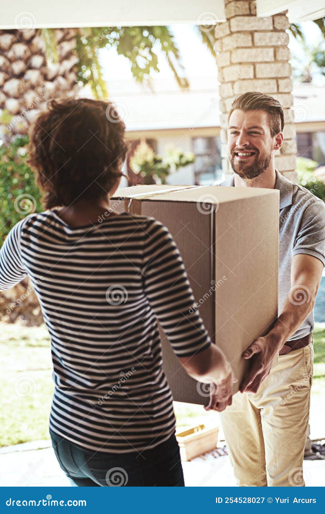 Service that Keeps His Customers Ordering More. a Delivery Man Making a ...