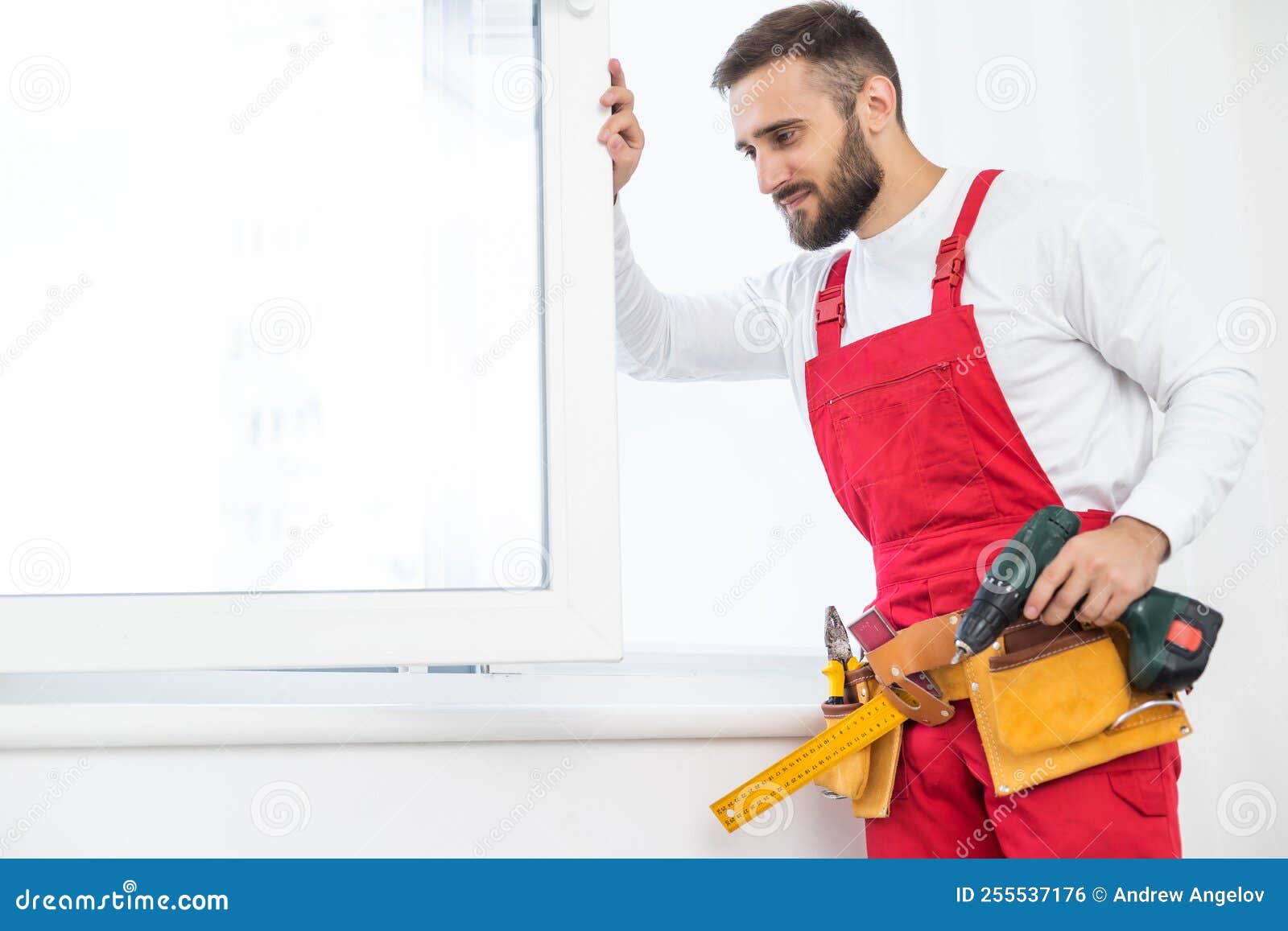 Service Man Installing Window with Screwdriver Stock Photo - Image of ...