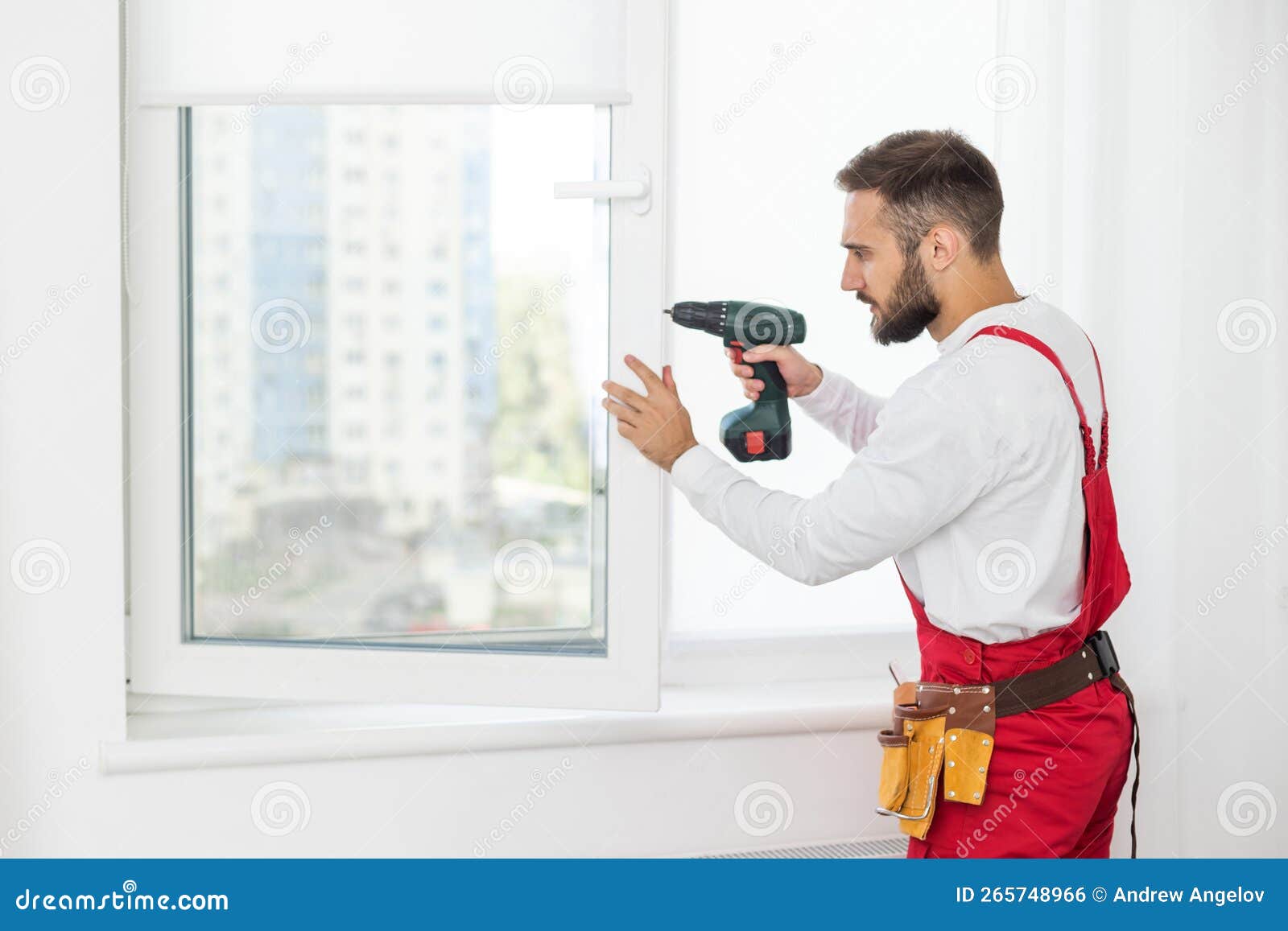 Service Man Installing Window with Screwdriver Stock Photo - Image of ...