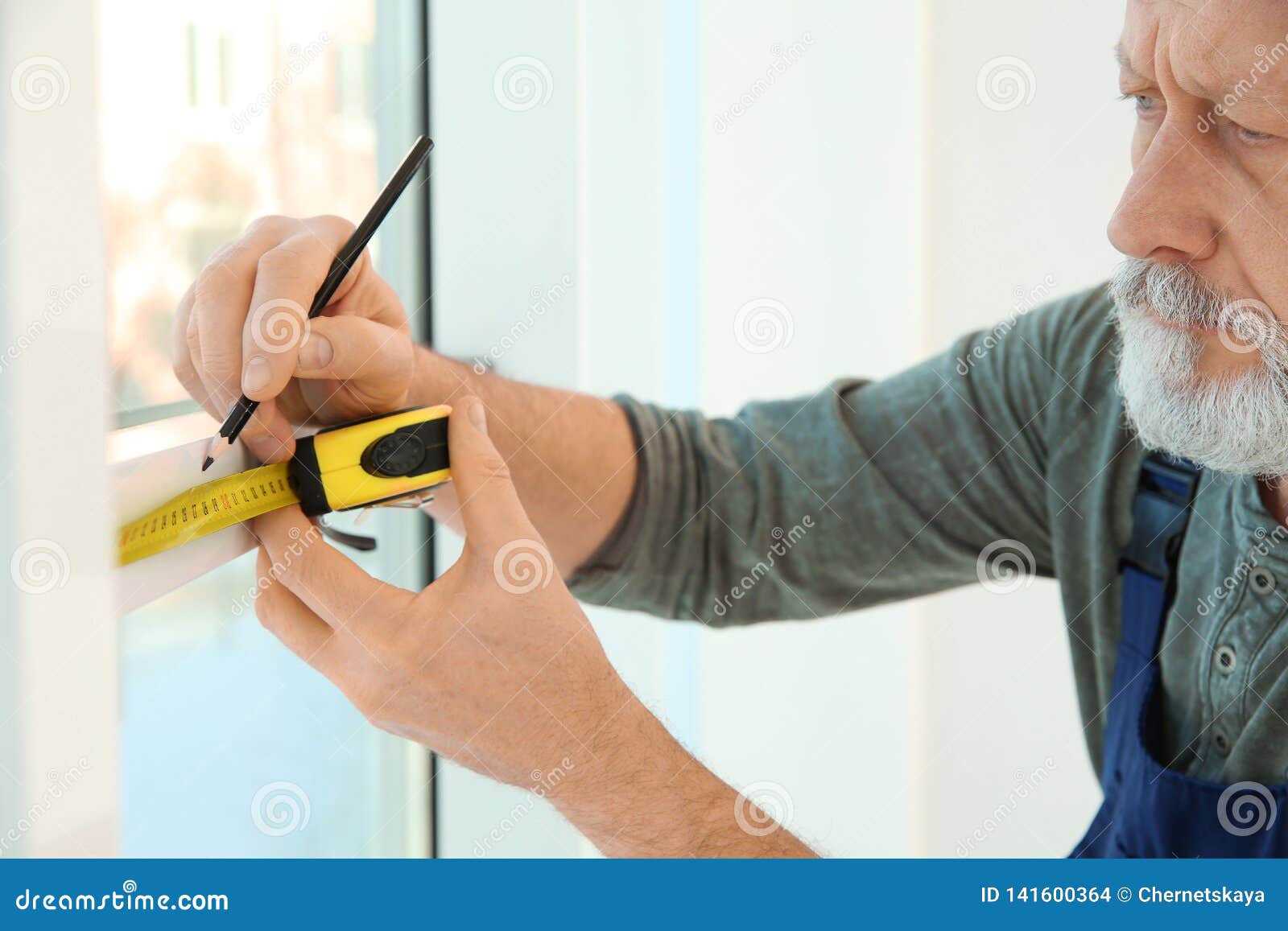 Service Man Measuring Window for Installation Stock Photo - Image of ...