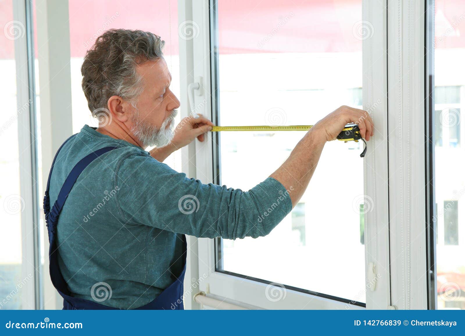 Service Man Measuring Window for Installation Stock Image - Image of ...