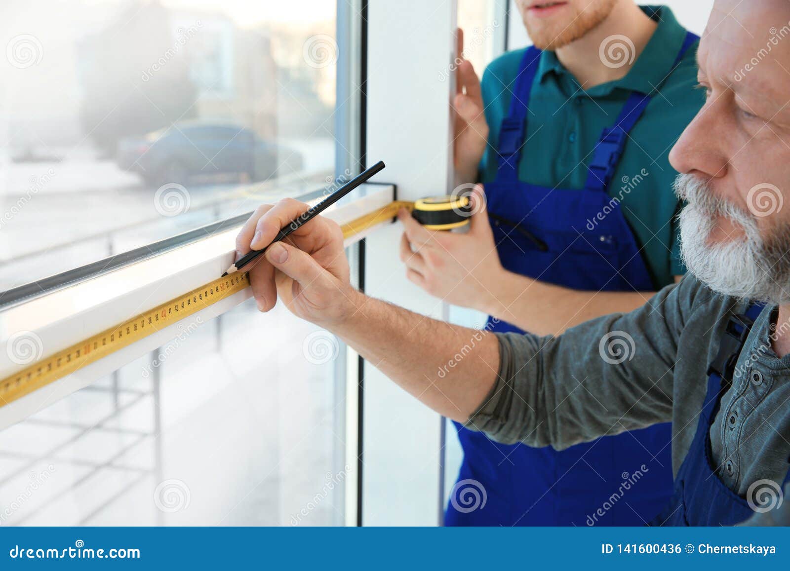 Service Men Measuring Window for Installation Stock Photo - Image of ...