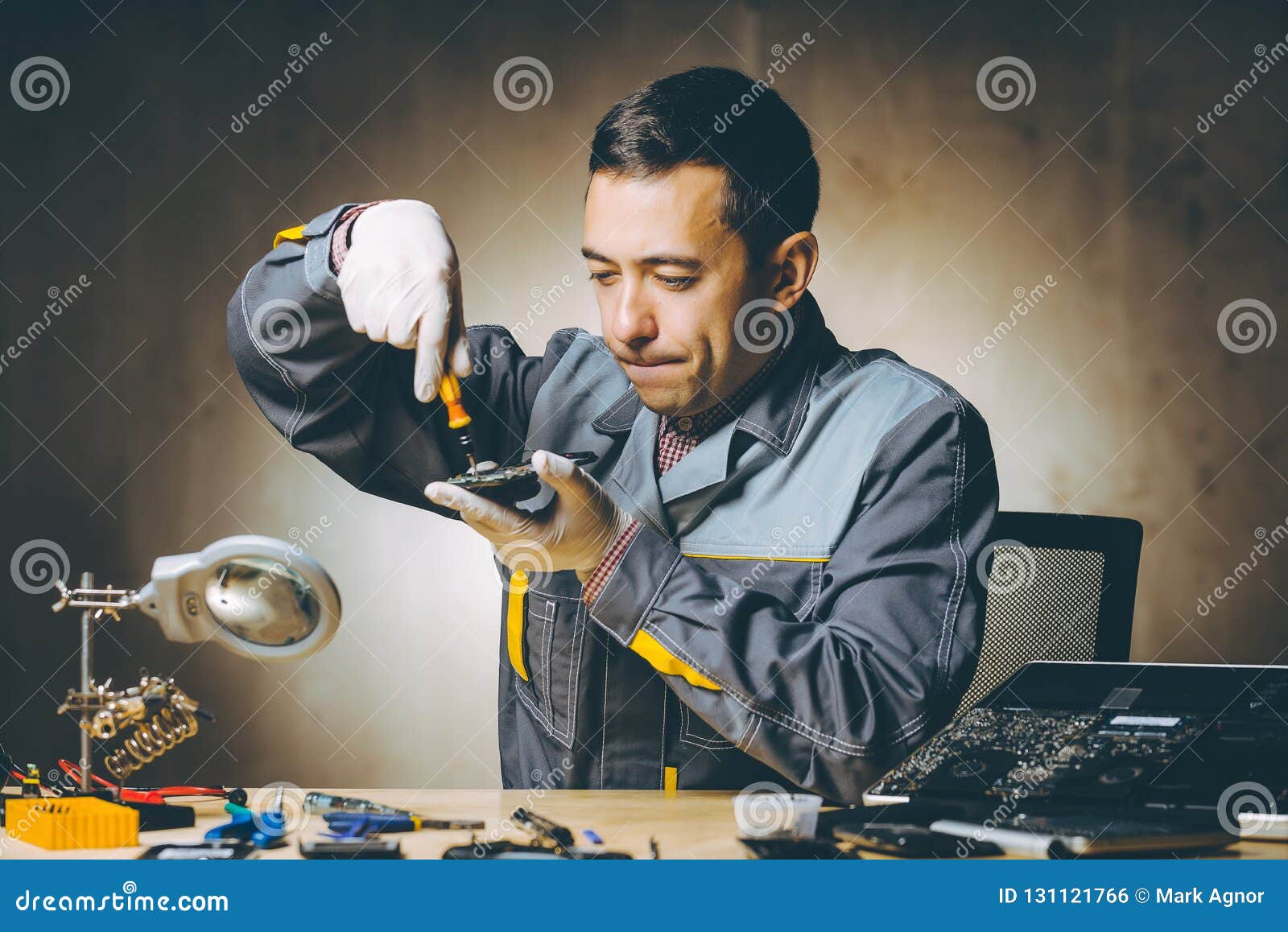 Service repair electronics stock photo. Image of person - 131121766