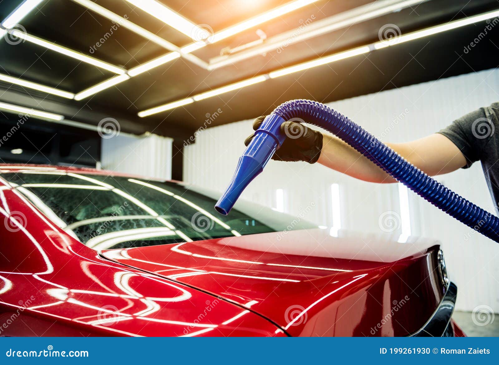 Service Worker Makes Automatic Drying of the Car after Washing. Stock ...