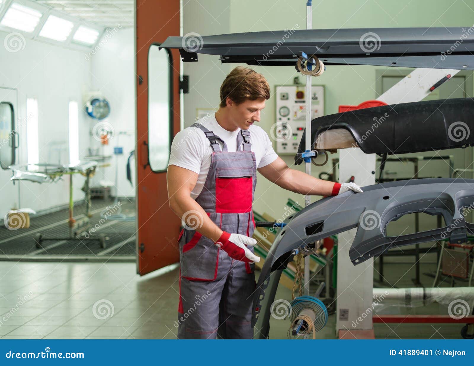 Serviceman in a Car Workshop Stock Image - Image of official ...