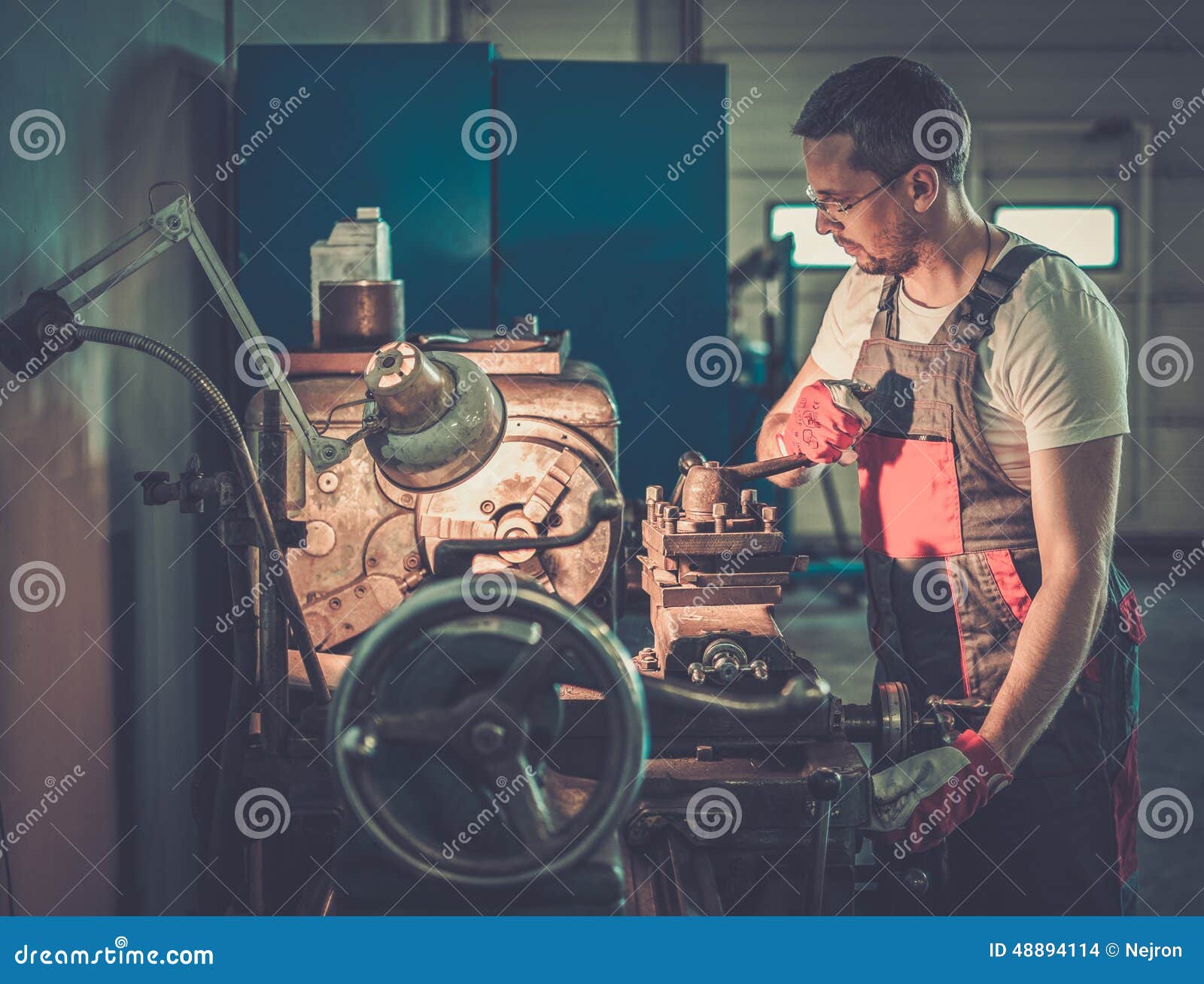 Serviceman in car workshop stock photo. Image of automobile - 48894114