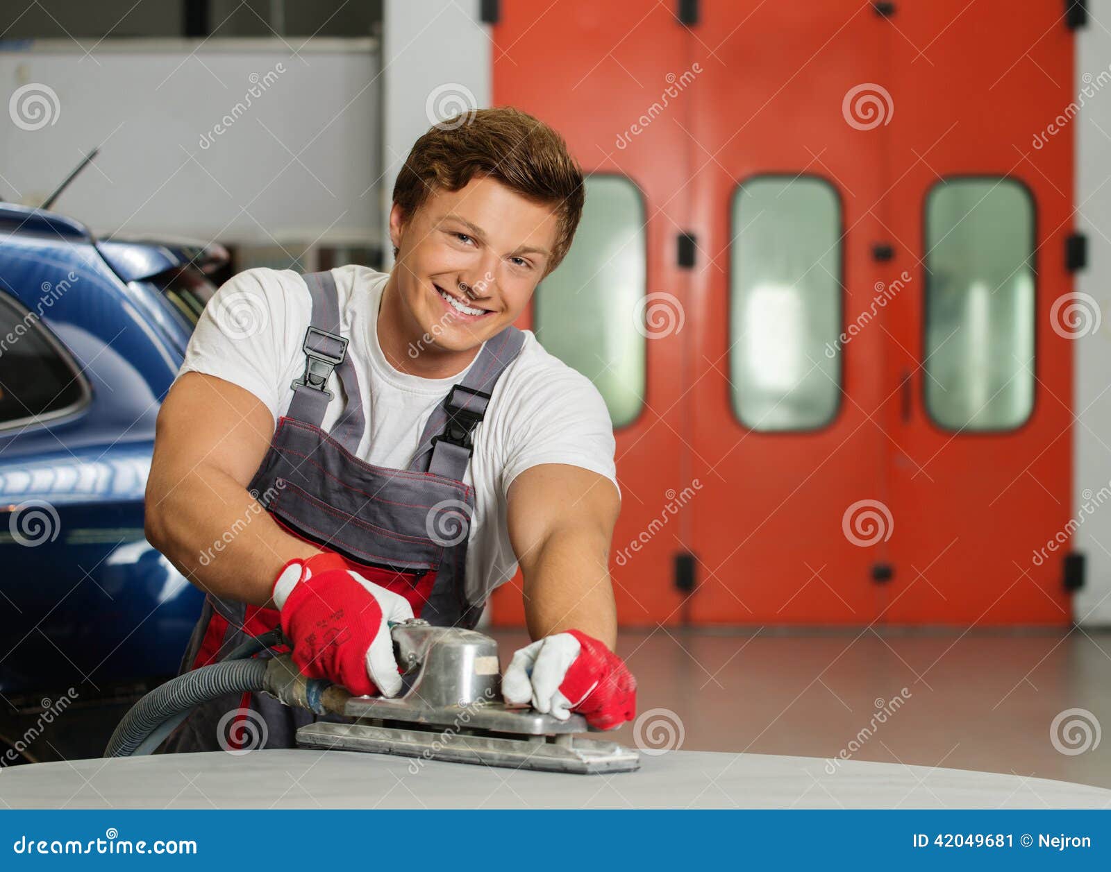 Serviceman in a Car Workshop Stock Image - Image of dealer, check: 42049681