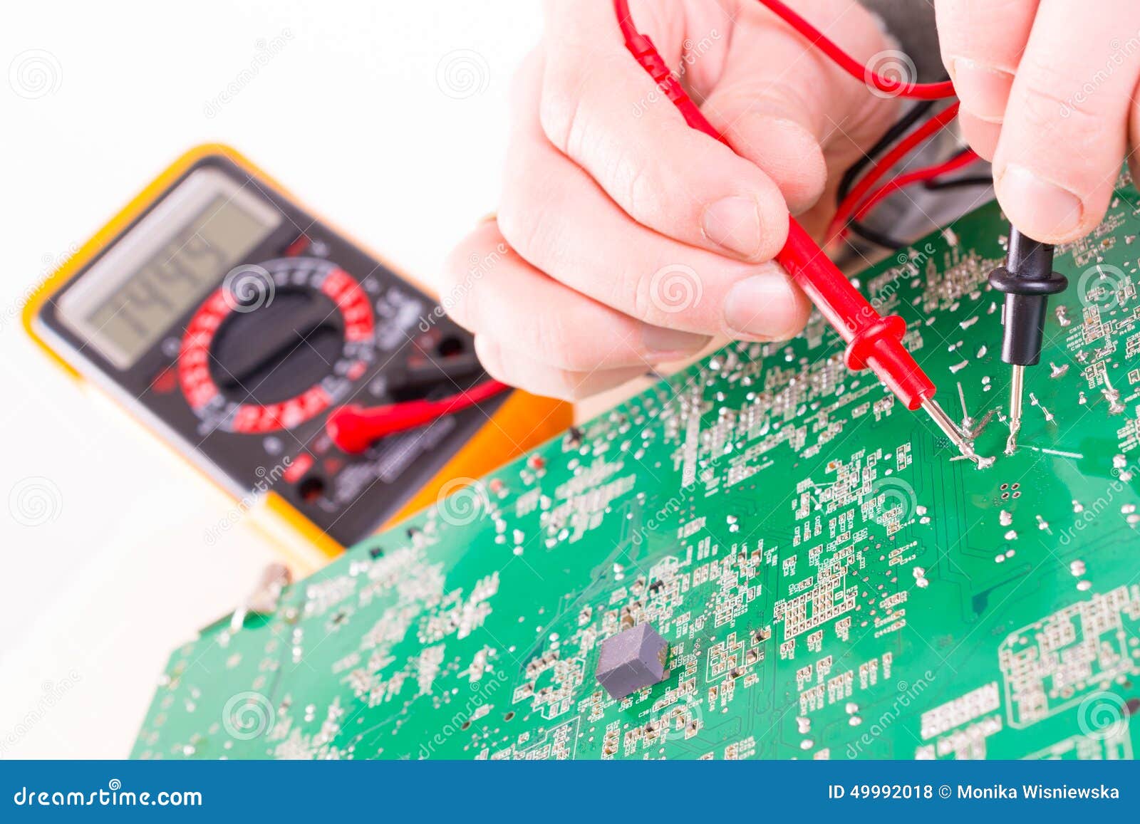 Serviceman Checks PCB with a Digital Multimeter Stock Photo - Image of ...