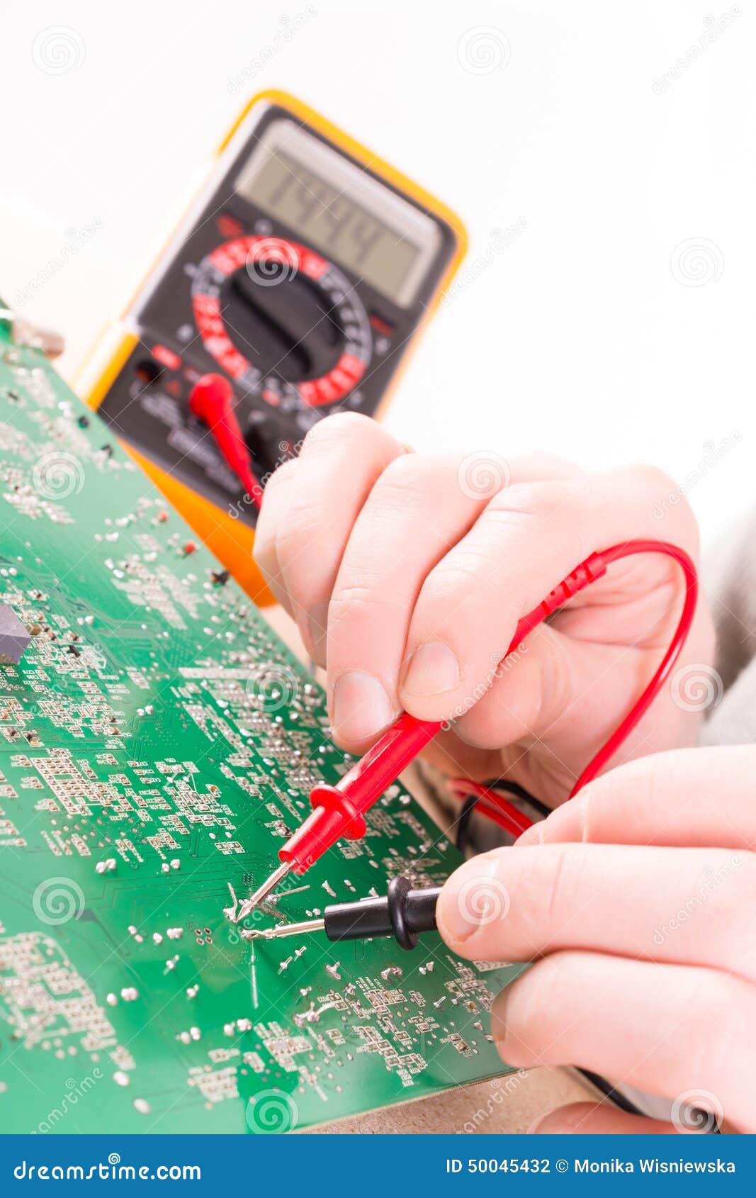 Serviceman Checks PCB with a Digital Multimeter Stock Photo - Image of ...