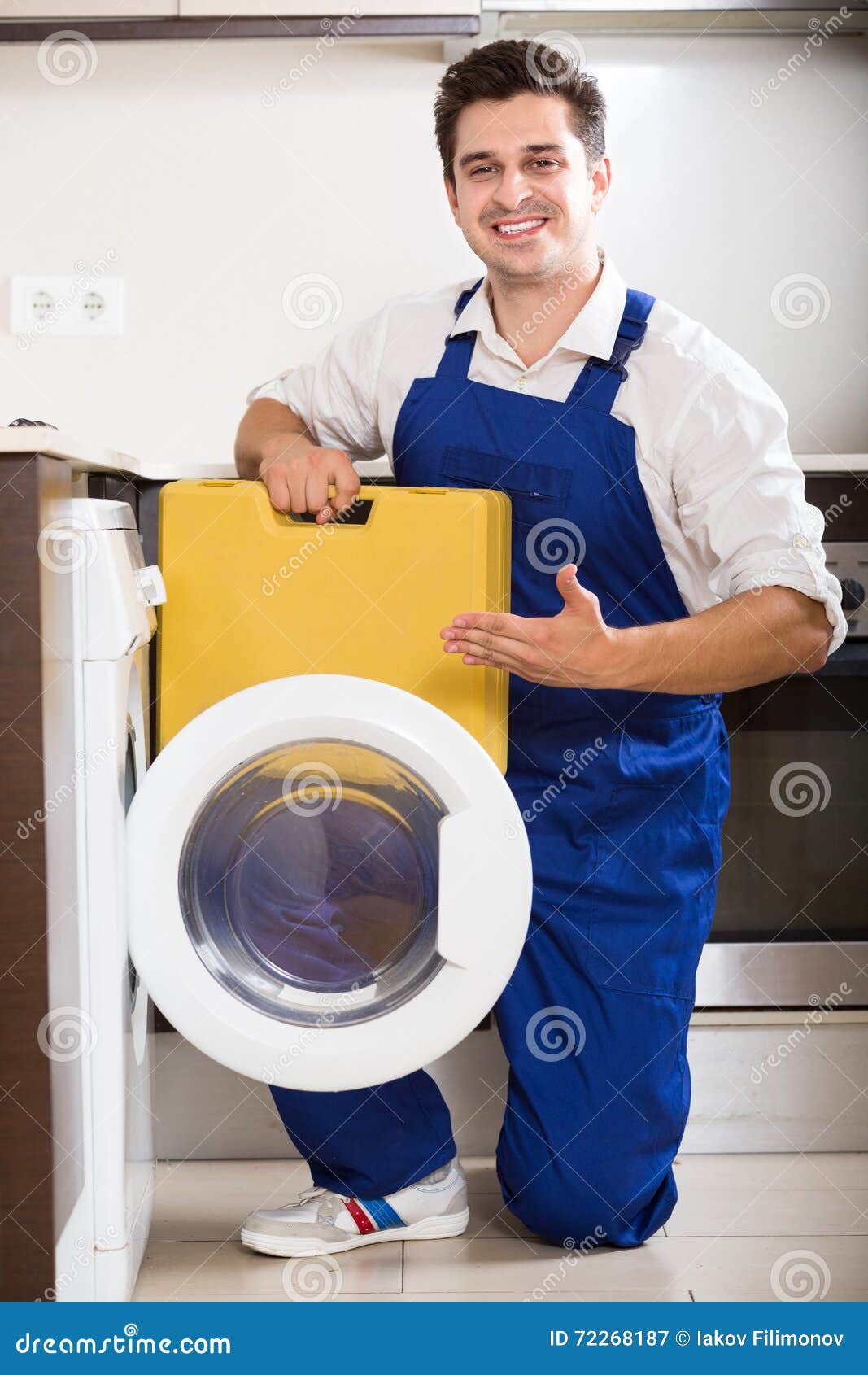 Serviceman Posing Near Washing Machine Stock Image - Image of engineer ...