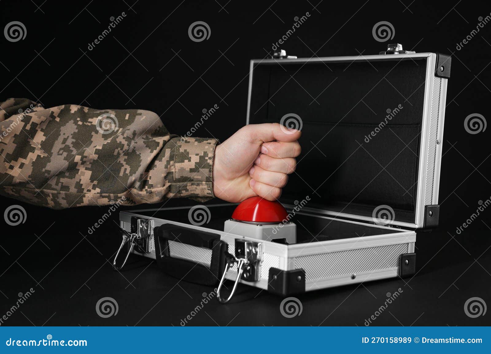 Serviceman Pressing Red Button of Nuclear Weapon at Black Table ...