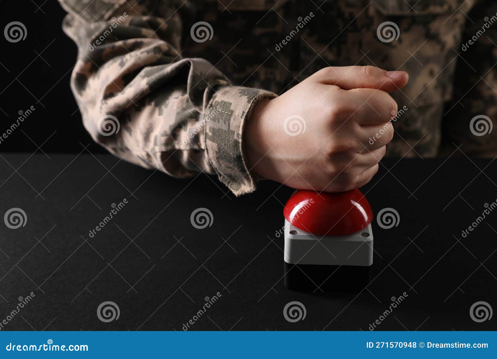 Serviceman Pressing Red Button of Nuclear Weapon at Black Table ...