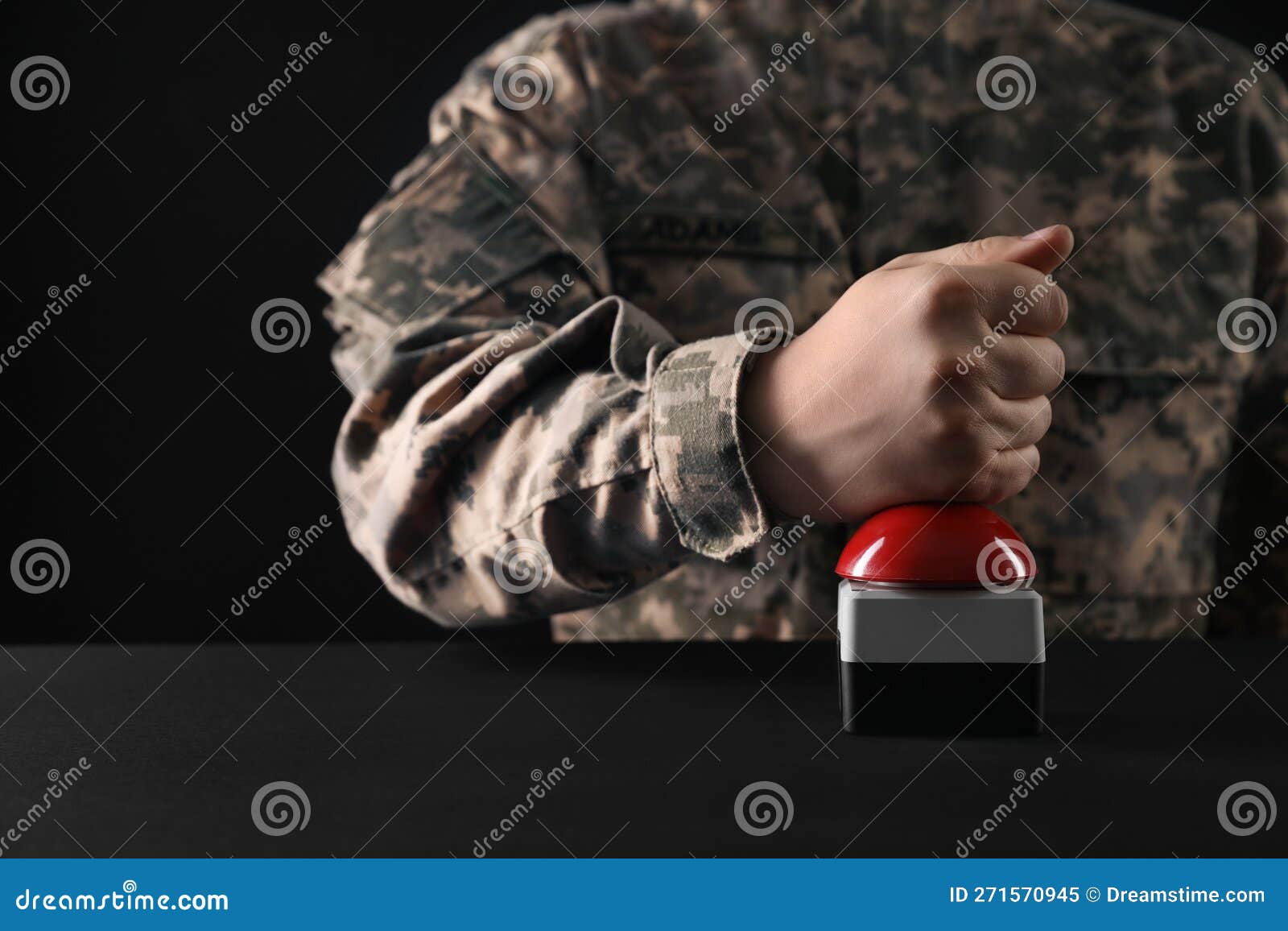 Serviceman Pressing Red Button of Nuclear Weapon at Black Table ...