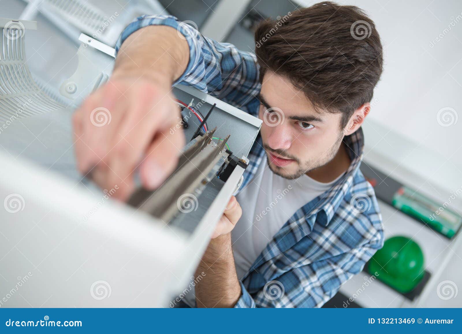 Serviceman Repairing a Device Stock Image - Image of chip, cable: 132213469