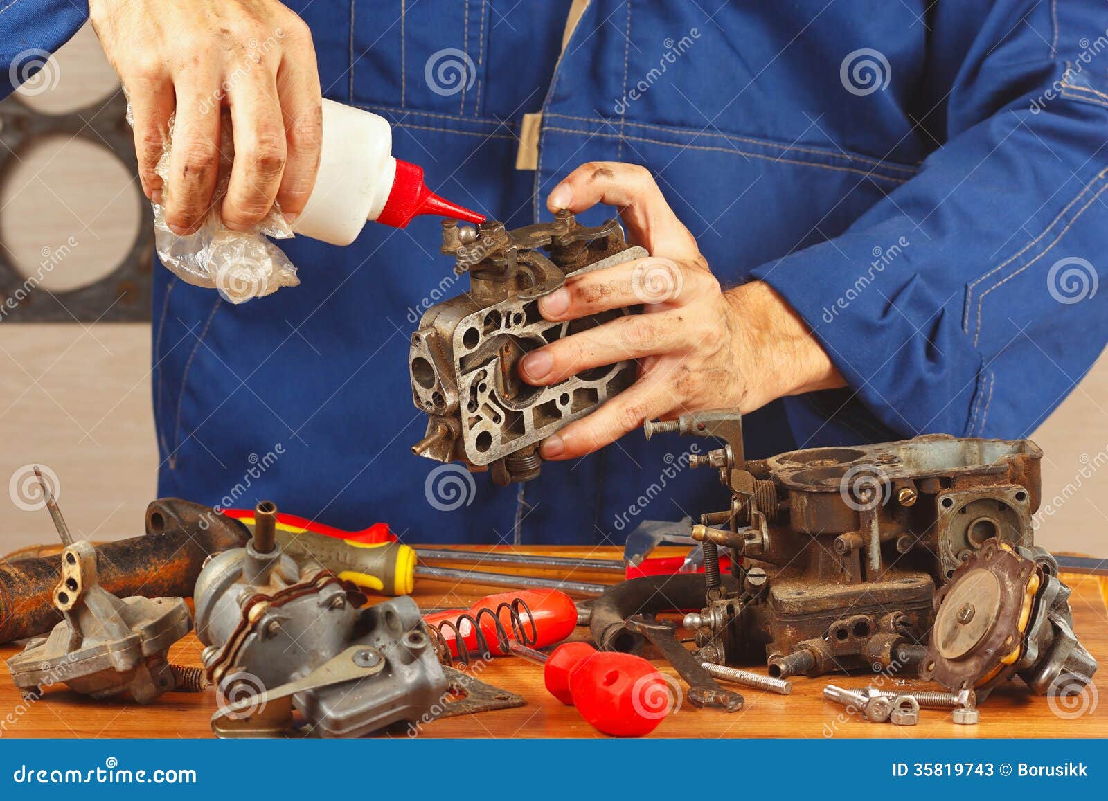 Serviceman Repairing Parts of Automobile Engine in Workshop Stock Image ...