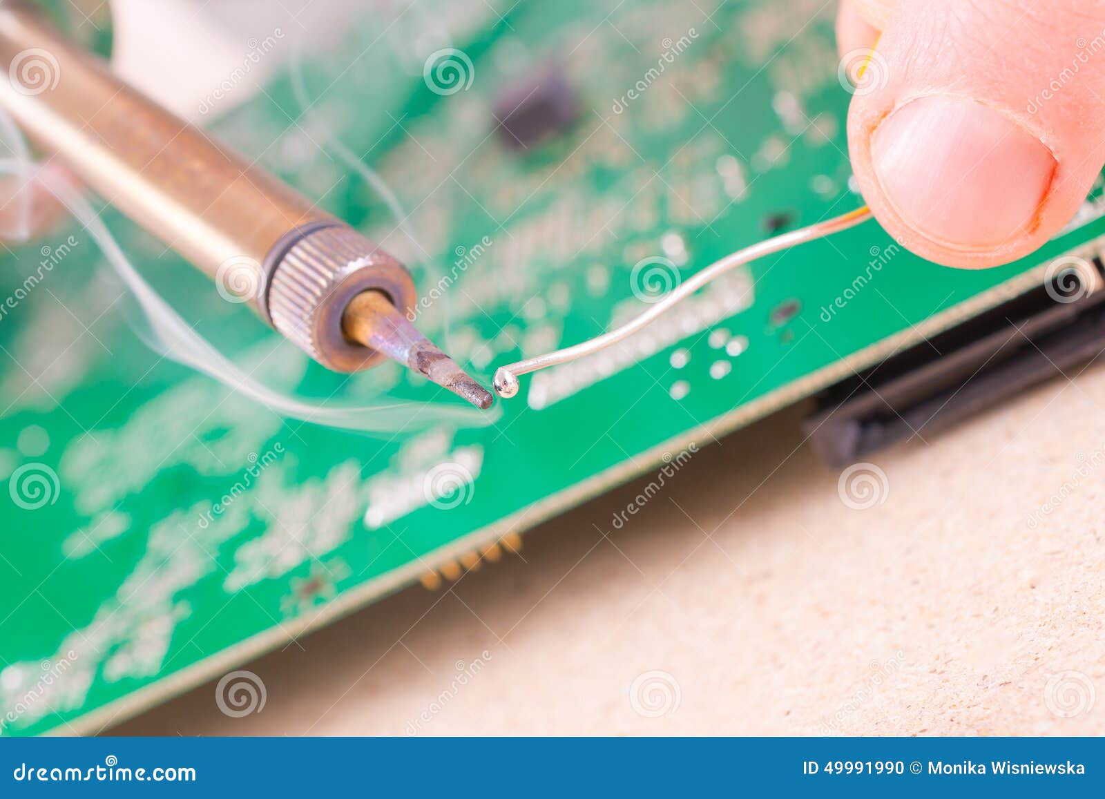 Serviceman Soldering on PCB Stock Photo - Image of repair, hand: 49991990