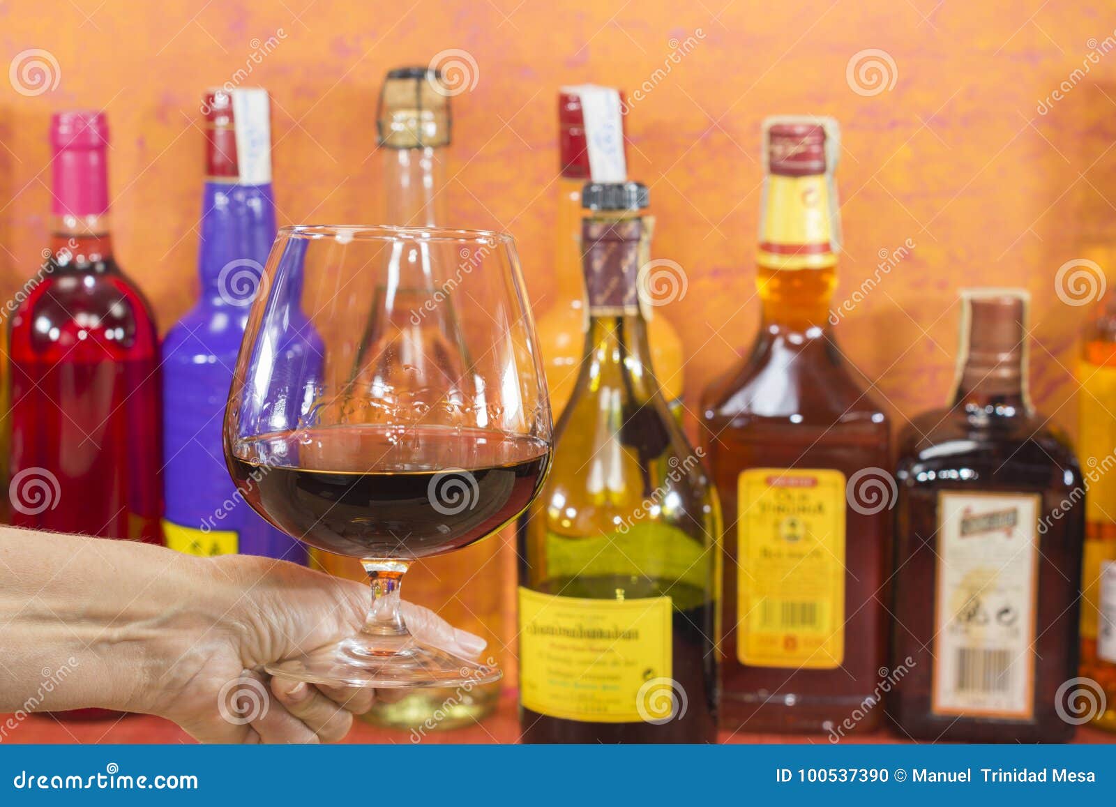 Serving a brandy stock photo. Image of alcoholic, bourbon - 100537390