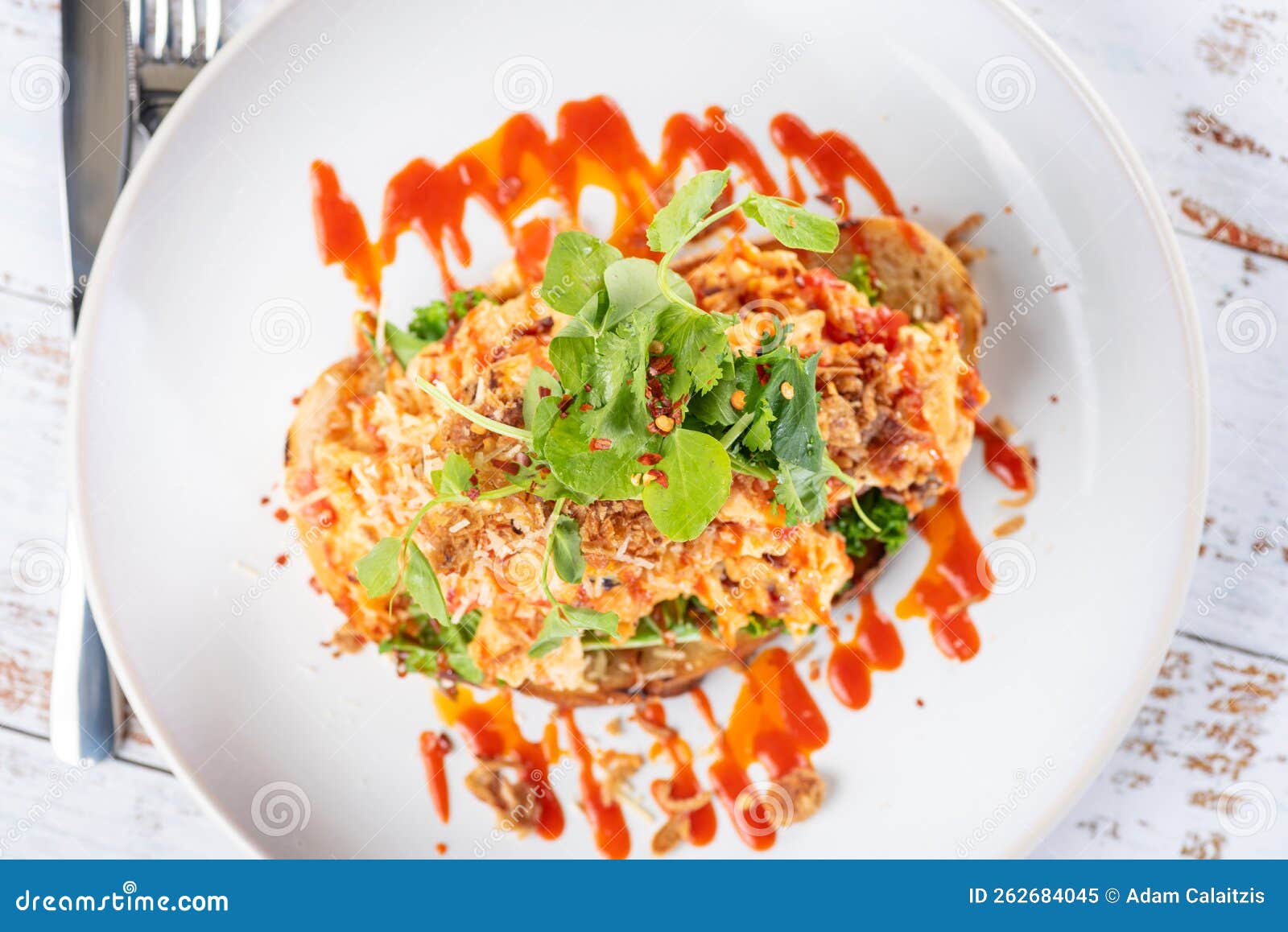 A Serving of Chilli Scramble, Scrambled Eggs with Sweet Chilli Sauce ...