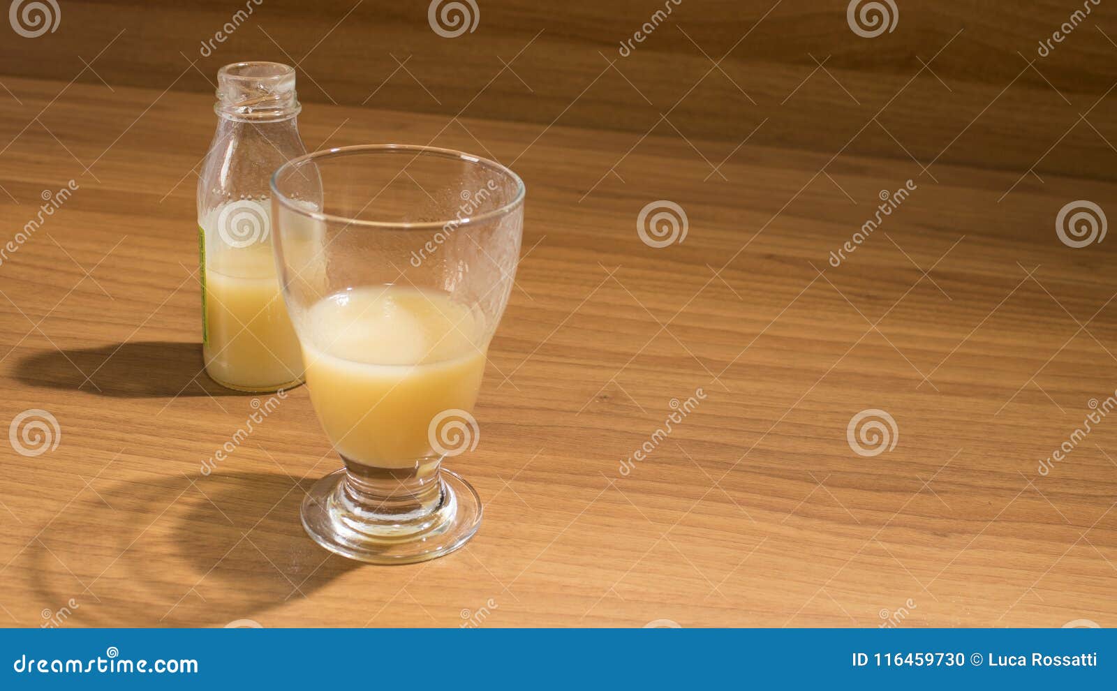 Serving a Fruit Juice on a Wood Table Stock Photo - Image of vitamins ...