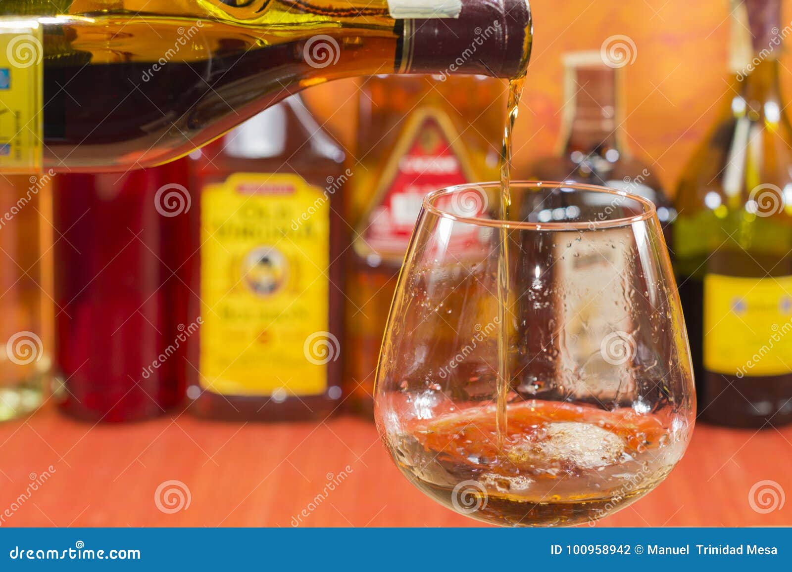 A glass of brandy stock photo. Image of bottle, hard - 100958942