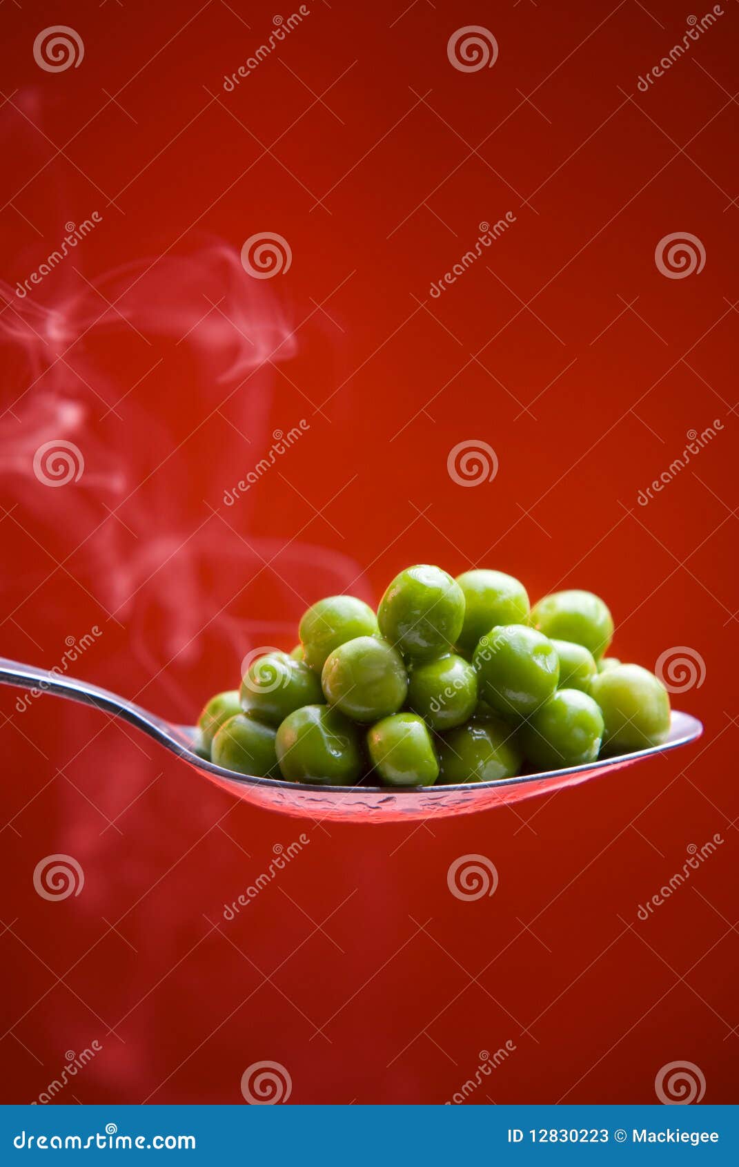 Serving green pea on spoon stock image. Image of detail - 12830223