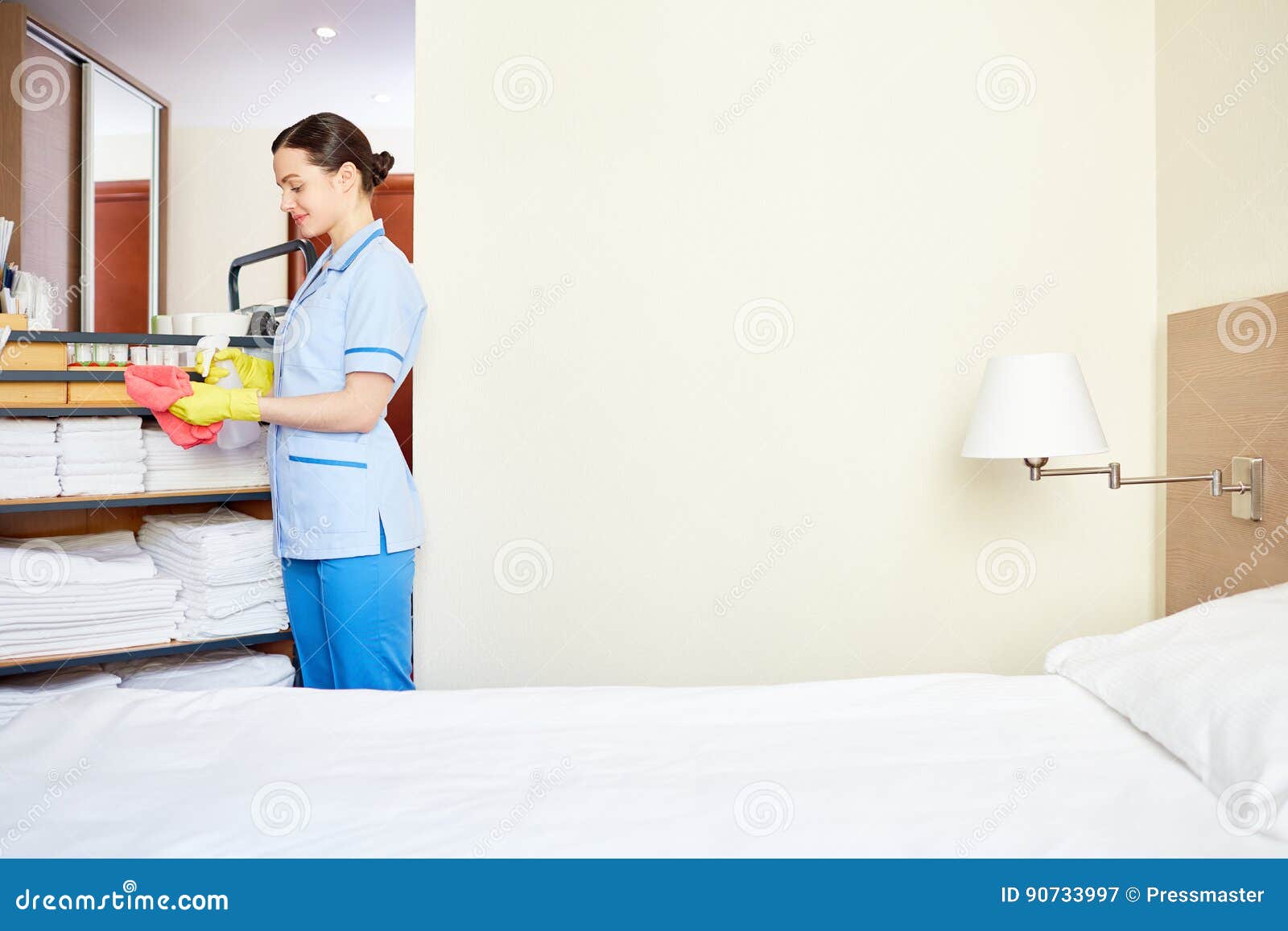 Serving hotel room stock image. Image of housekeeper - 90733997