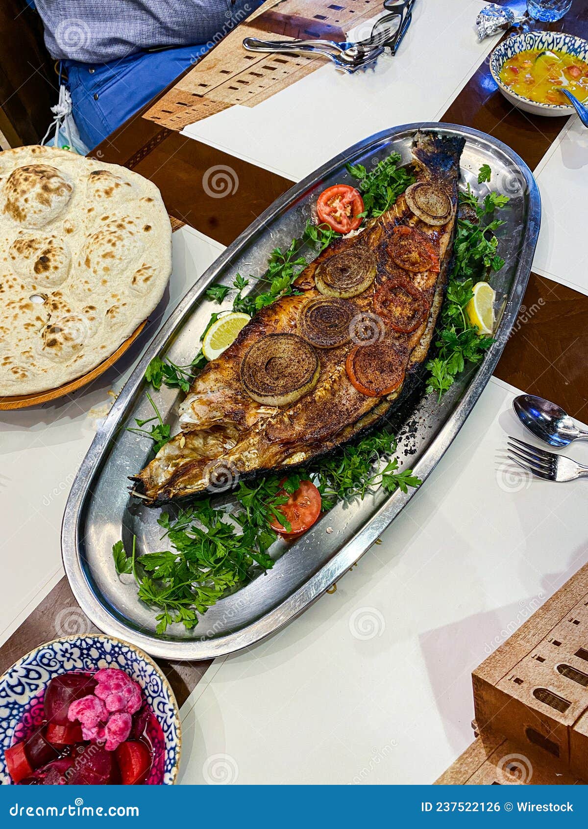 Serving of Iraqi Masgouf stock photo. Image of lunch - 237522126