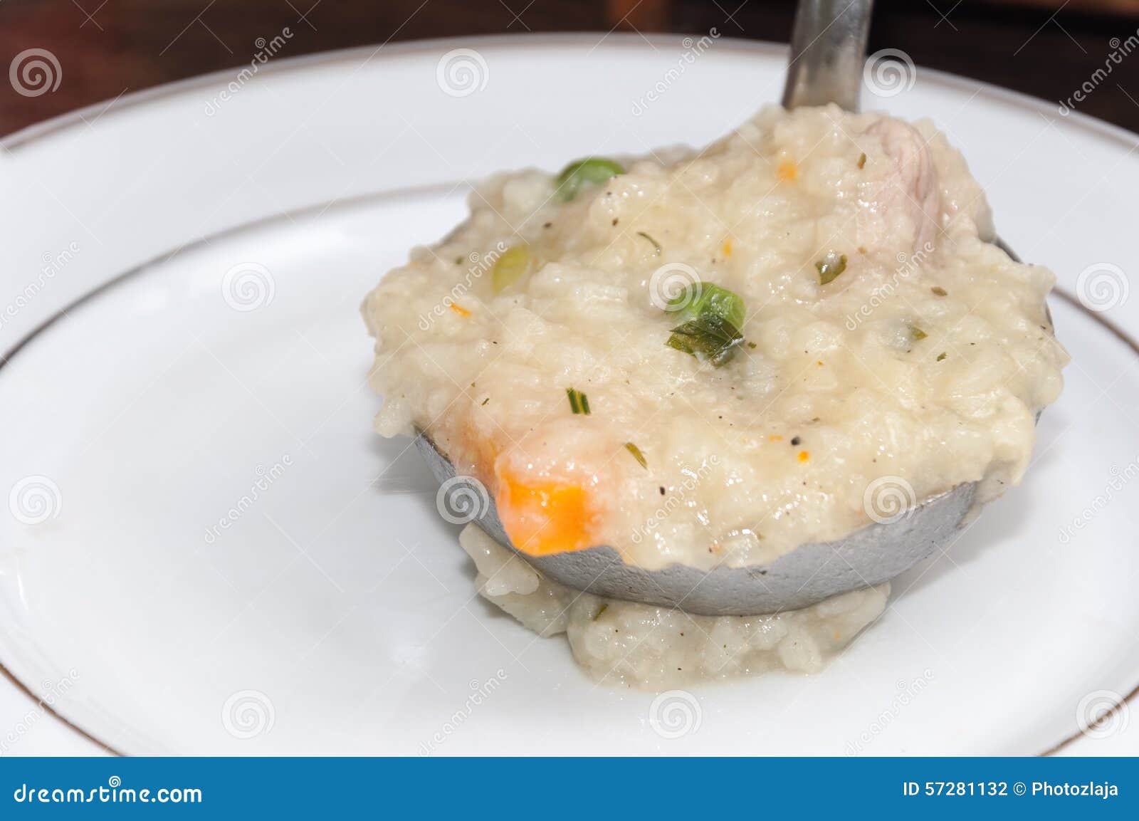 Serving Rise Risotto with the Ladle Stock Photo - Image of vegetable ...