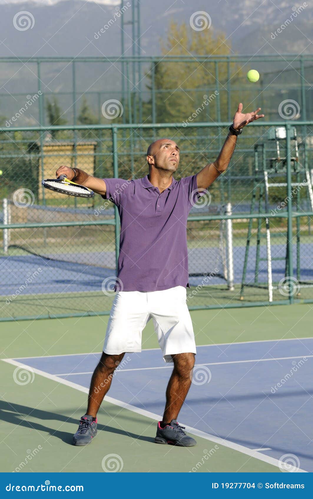 Serving a tennis ball stock photo. Image of active, action - 19277704